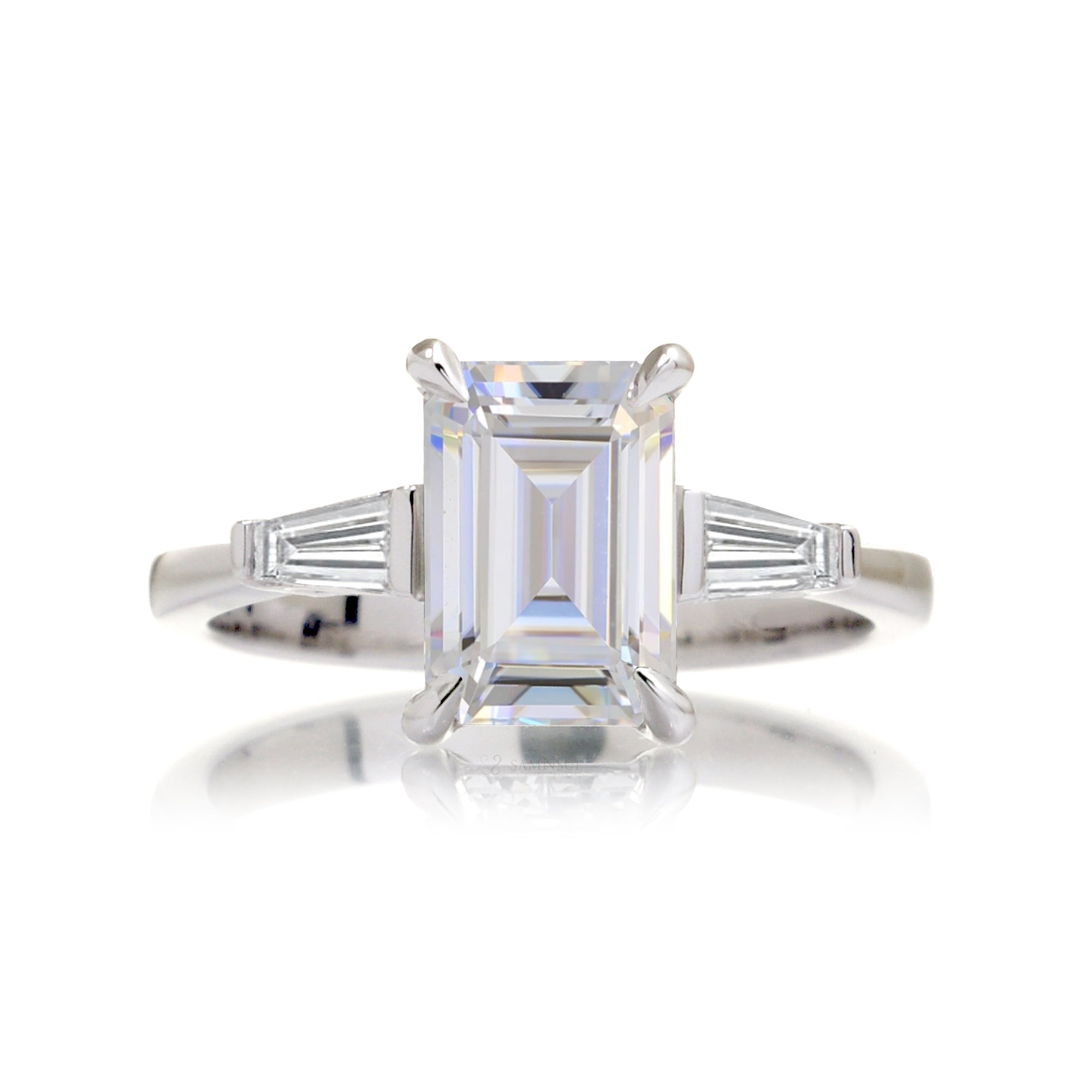 The Alice Emerald Step Cut Moissanite Three Stone Baguette Ring