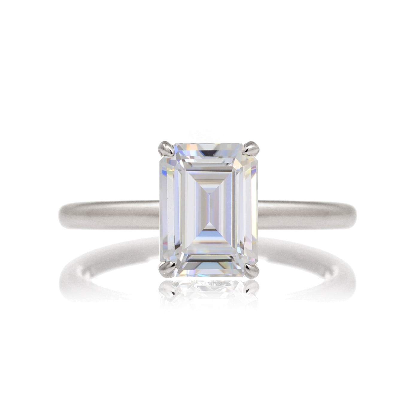 The Lucy Emerald Step Cut Moissanite Ring