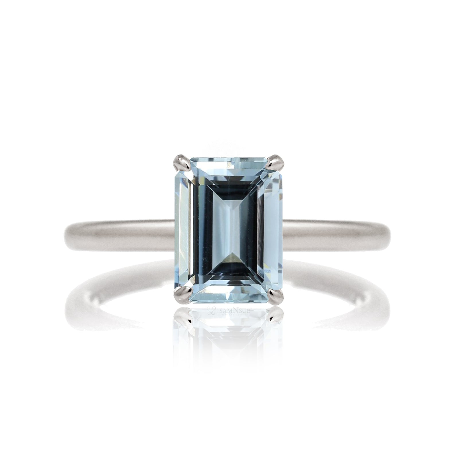 The Lucy Emerald Step Cut Aquamarine Ring With Hidden Halo Solid Band