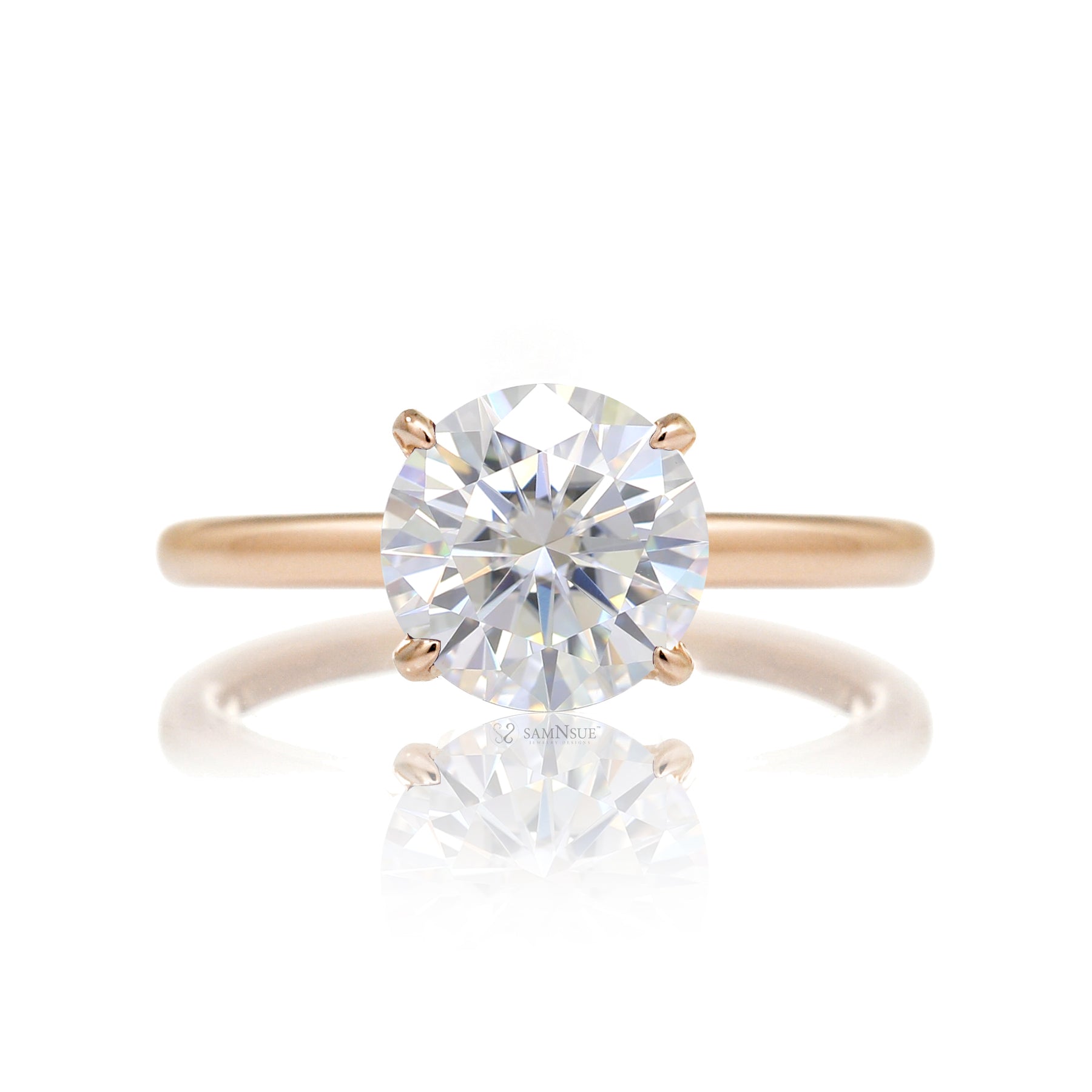 The Lucy Round Brilliant Moissanite Engagement Ring Diamond Accent