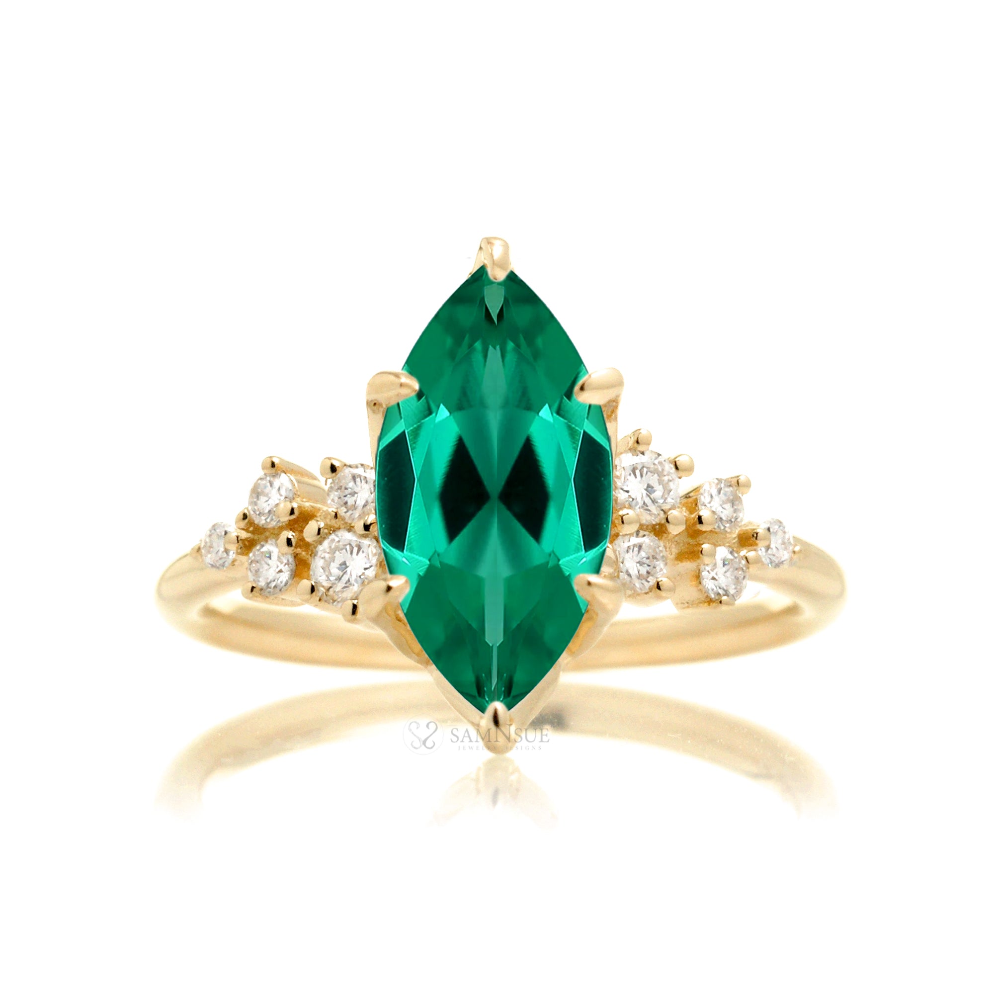 The Stella Marquise Cut Emerald And Diamond Ring