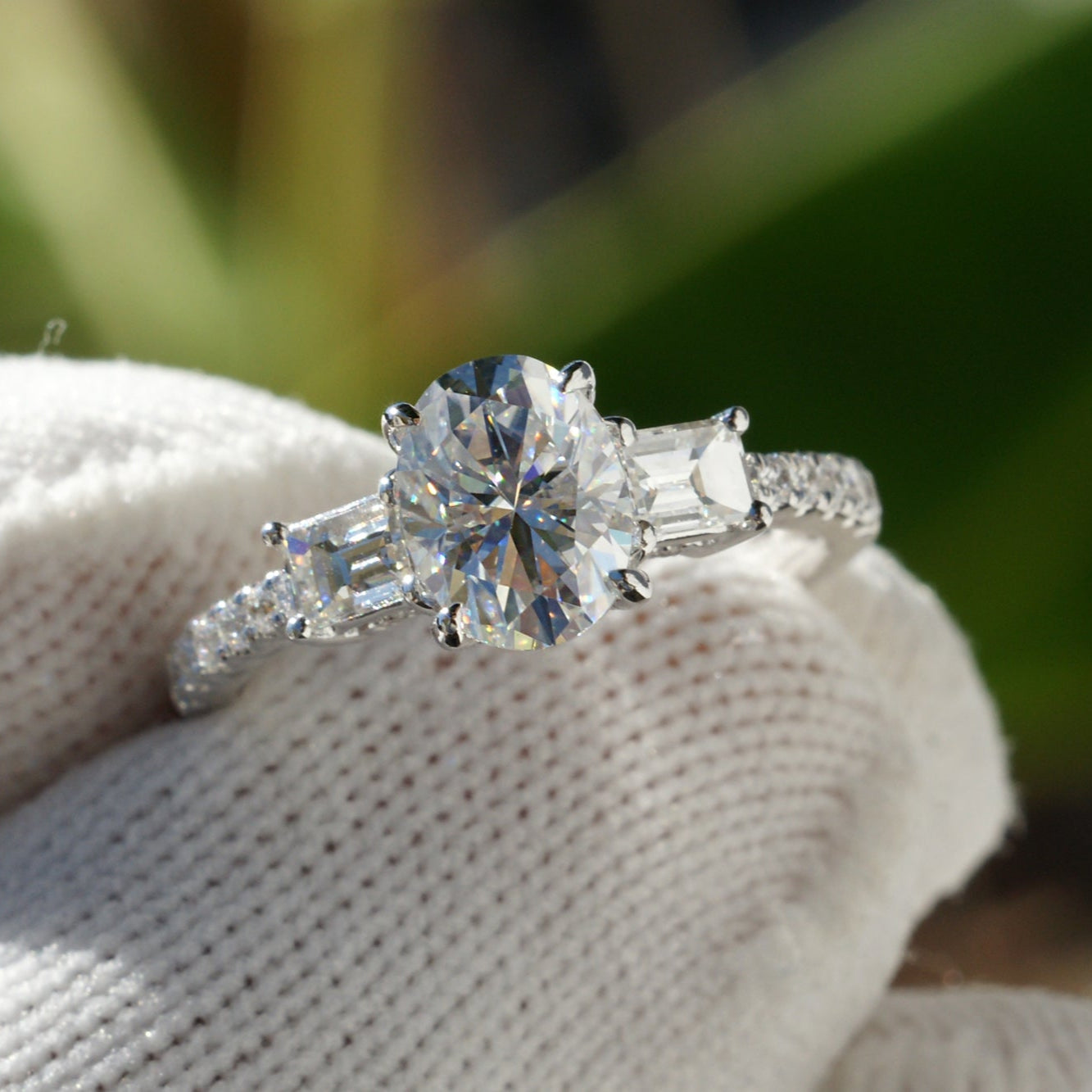 Oval moissanite engagement ring three stone design - the Rey